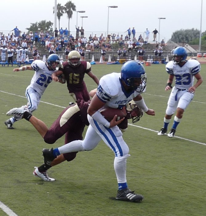 Photo: La Jolla Country Day running back Montell Allen wrapped up by ...