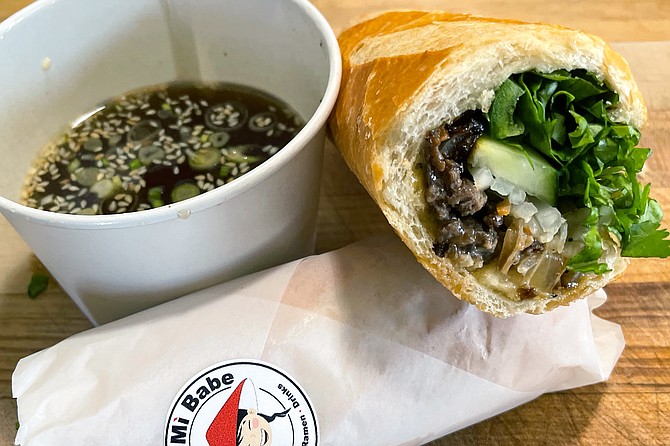 Photo: A French dip add-on to a filet mignon banh mi | San Diego Reader