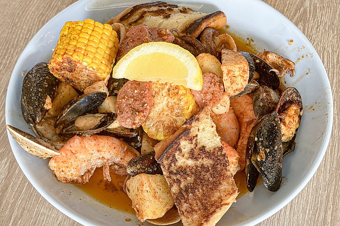 Photo: A cajun spiced seafood boil | San Diego Reader